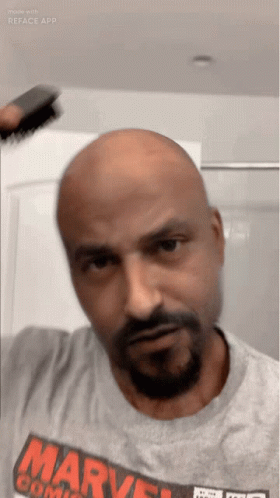 Kourada Xarrois Combs Bald Head GIF - Share & View on KLIPY